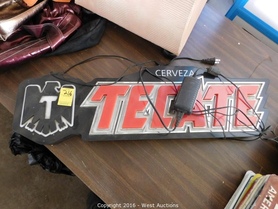 West Auctions - Auction: Arcade Games and Hotel Furniture ITEM: Tecate Sign