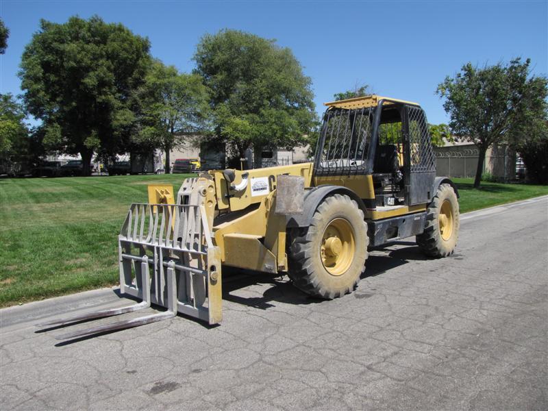 West Auctions - Auction: Masonry Construction Company ITEM: Cat TH-83 ...